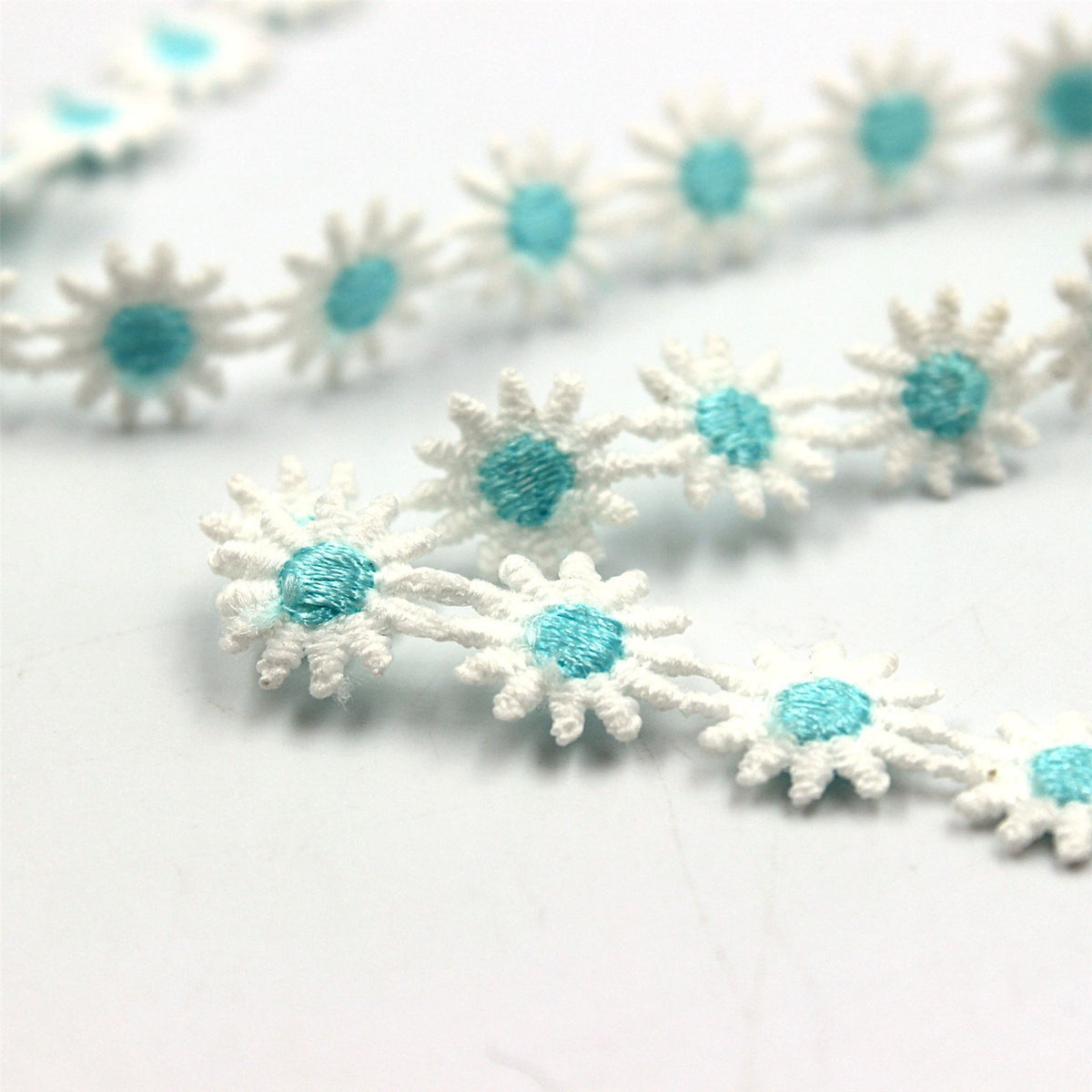 White Daisy Braid With Colourful Center 12mm 5427 – Barnett Lawson ...